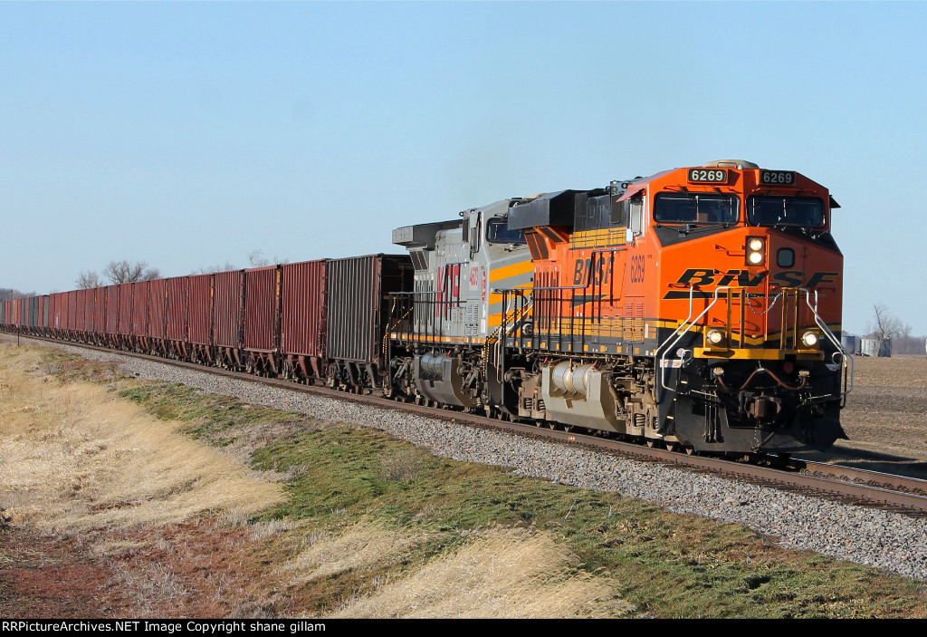 BNSF 6269 Leads KCS 4603 on a loaded ore train.